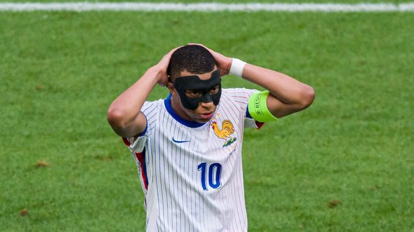 France's 'luck' continues as Mbappe struggles with mask