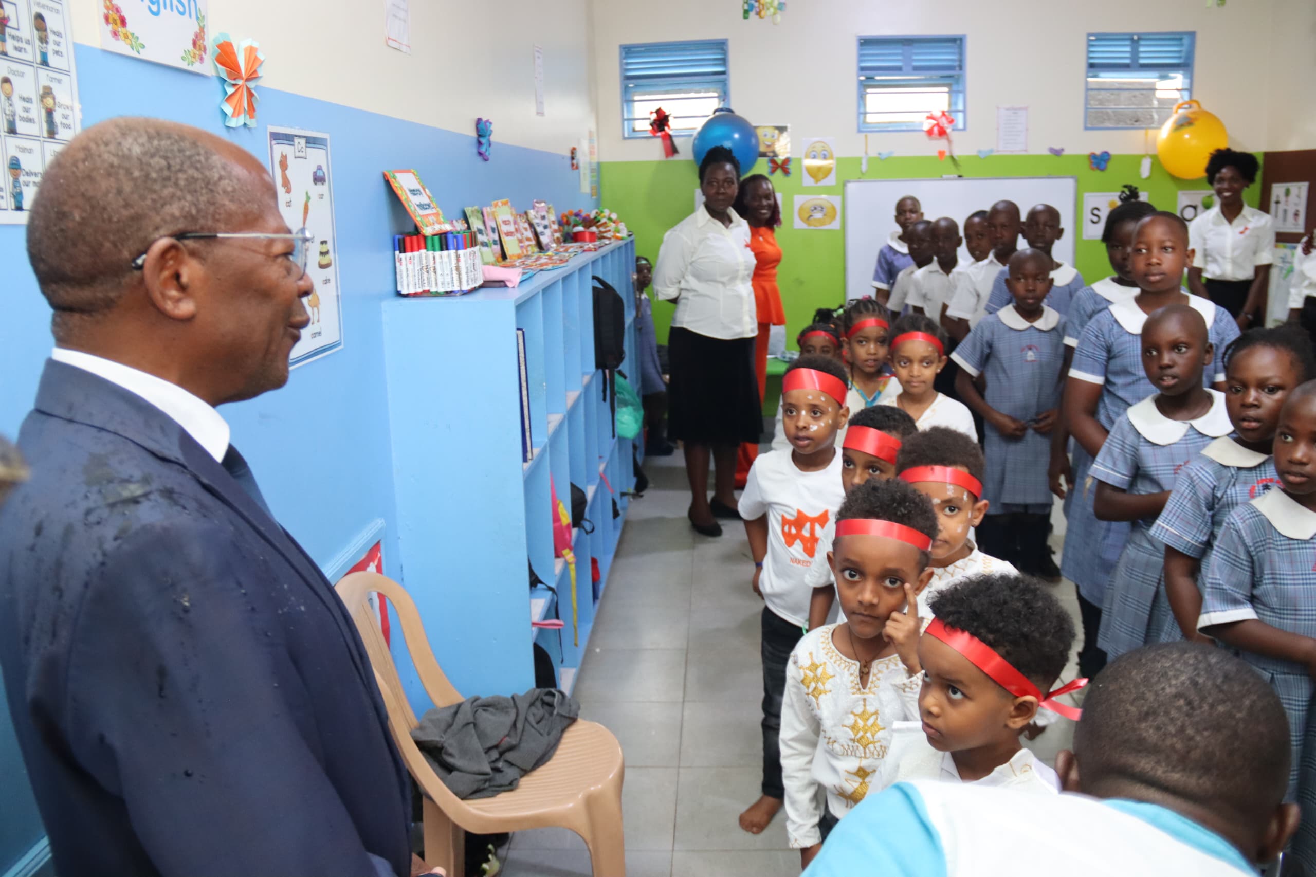 Minister Muyingo Warns Against Indecent Dressing in Schools