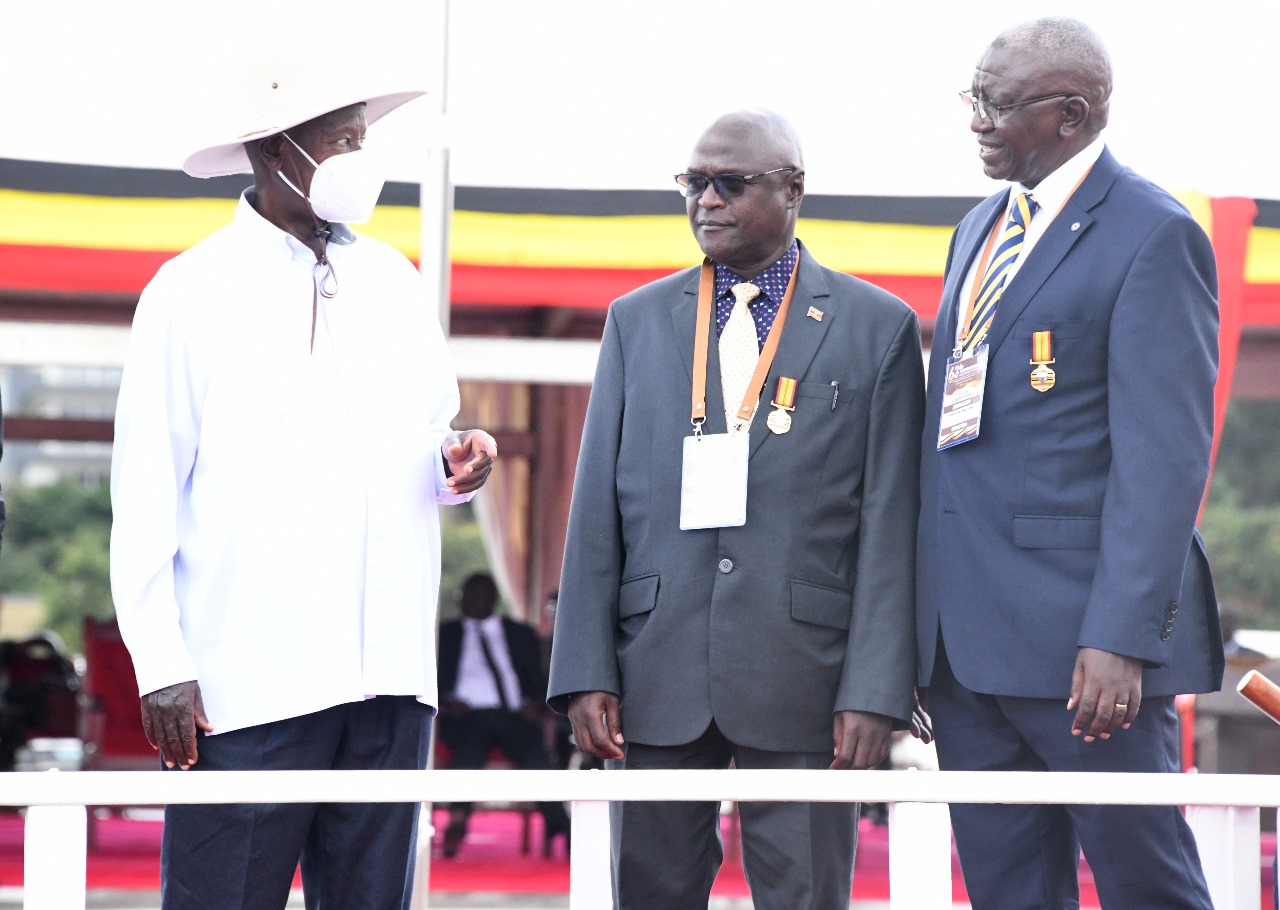 President Museveni honours Red Cross chief Robert Kwesiga