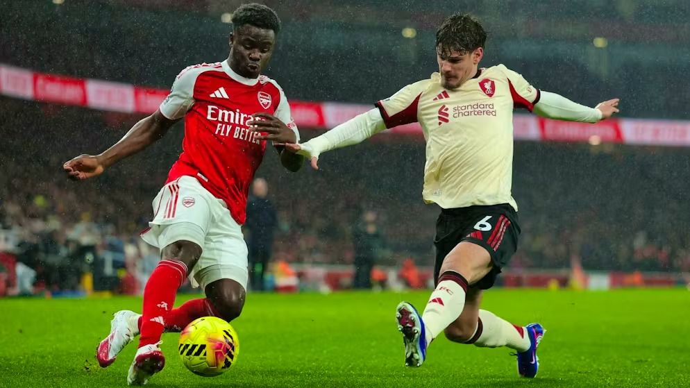 Arsenal go six points clear after insipid draw with Liverpool