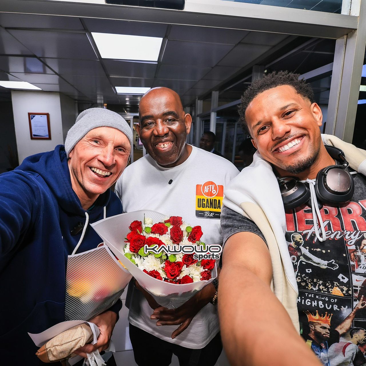 Arsenal Fan TV boss Robbie Lyle, team in Kampala