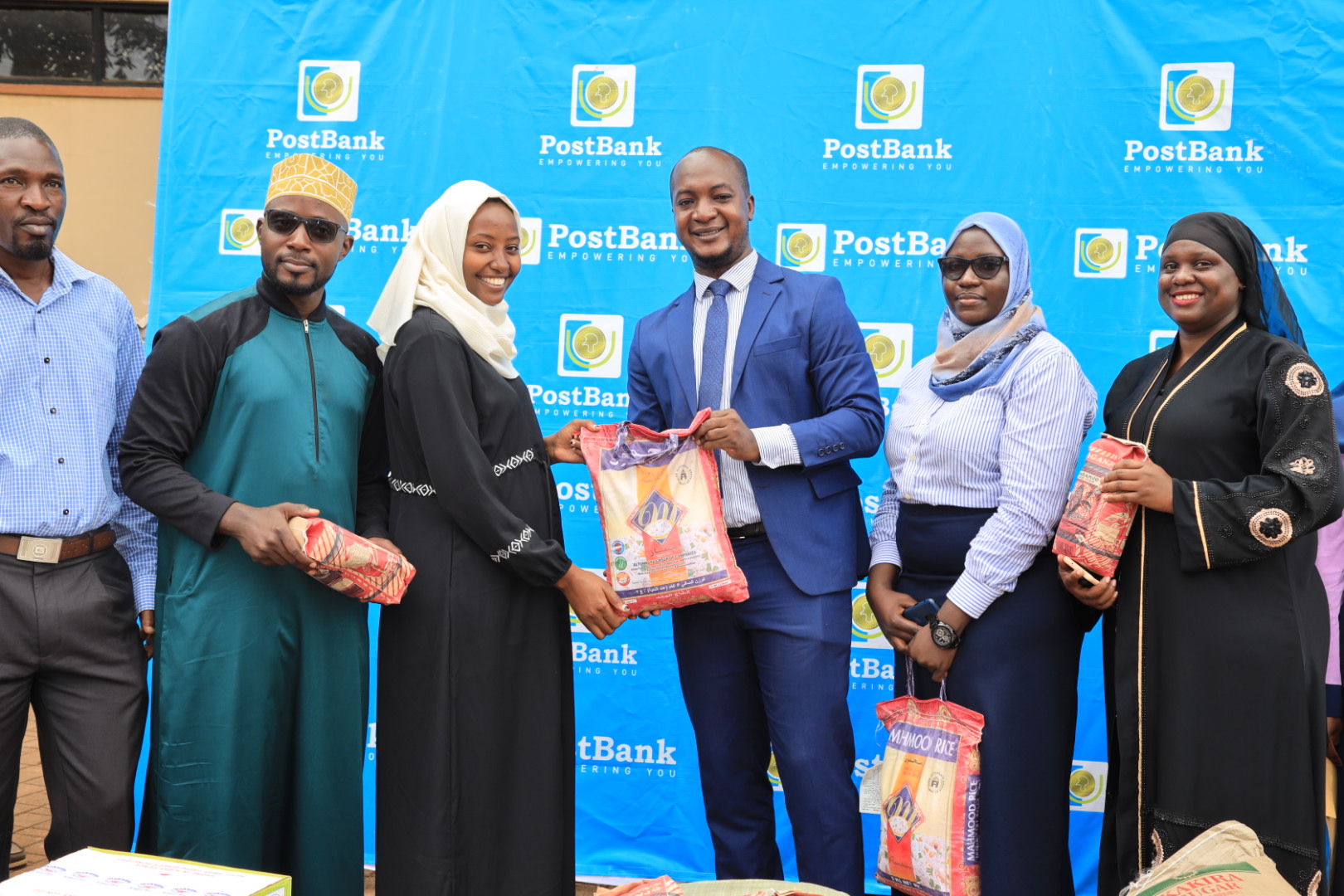 PostBank donates food items to Muslim community in public universities